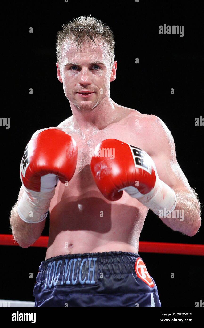 Martin Power (blue shorts) defeats Francis Croes in a Super-Flyweight ...
