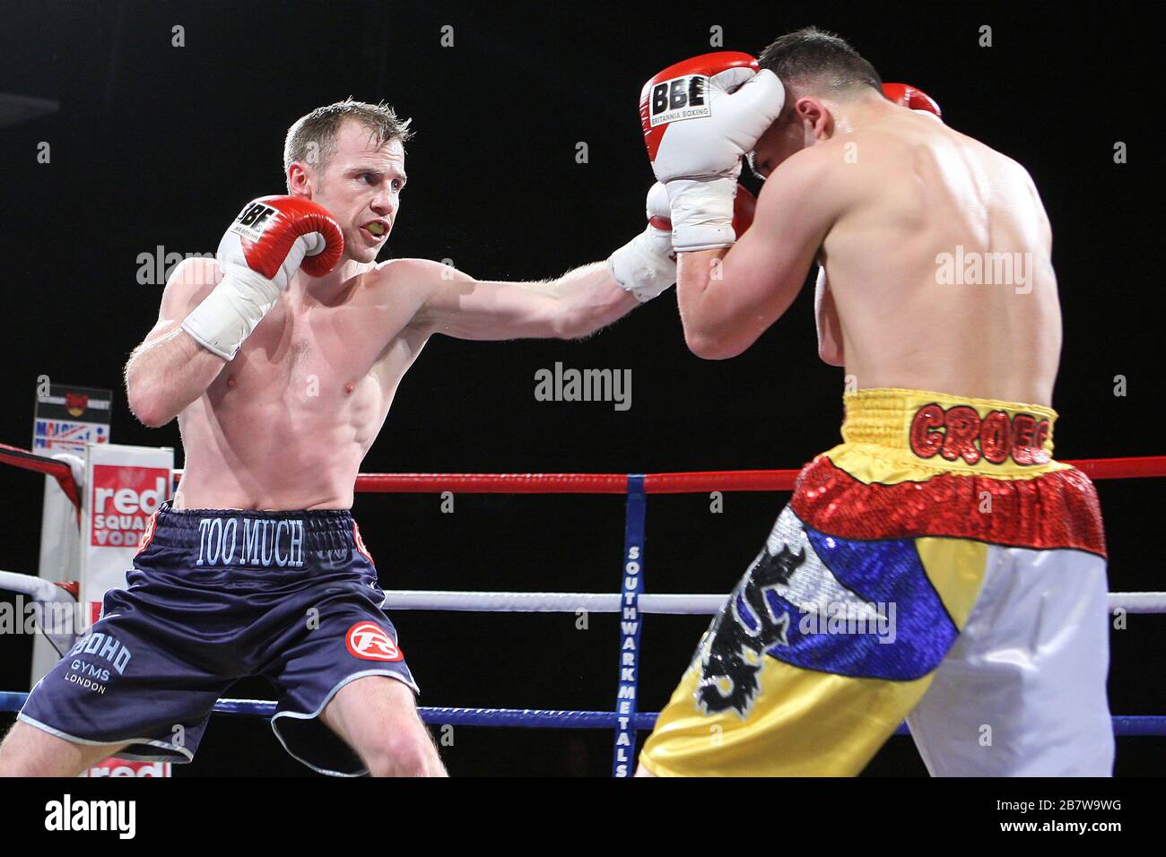 Martin Power (blue shorts) defeats Francis Croes in a Super-Flyweight ...