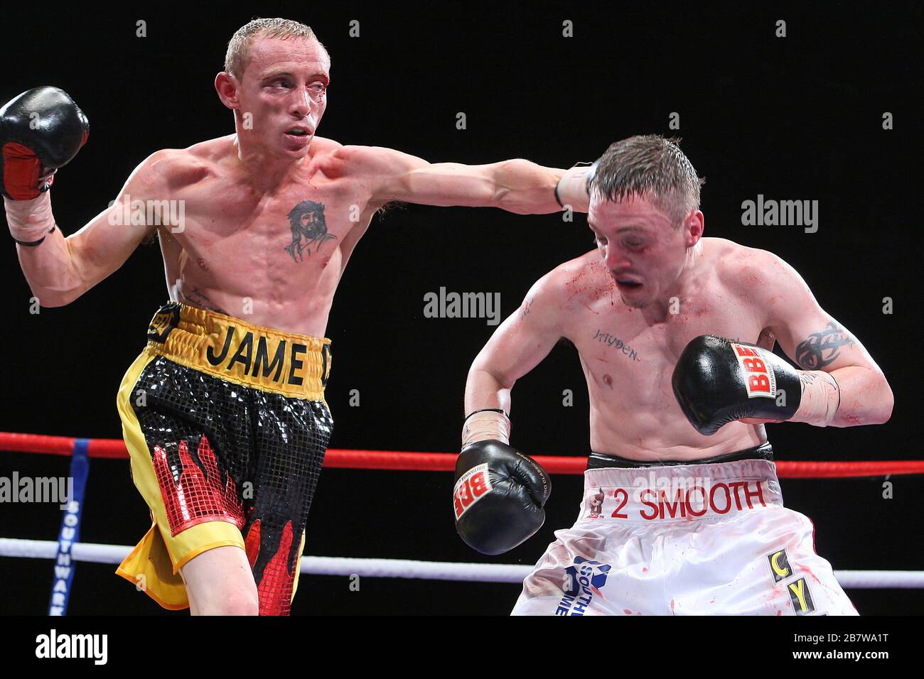 Jason Booth (white shorts) defeats Jamie Arthur in a Super-Middleweight ...