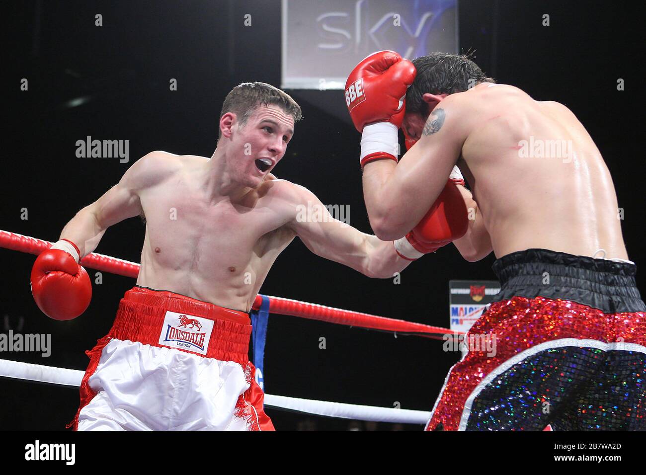 Johnson McClumpha (white/red shorts) defeats Kevin McCauley in a Light ...