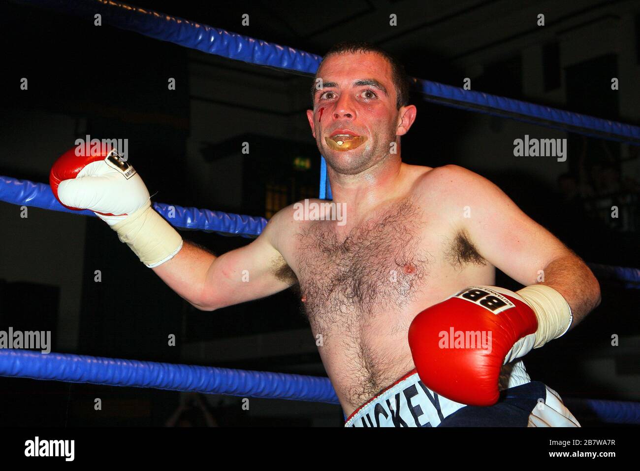 Choi Tseveenpurev (red/blue shorts) defeats Mickey Coveney in a ...