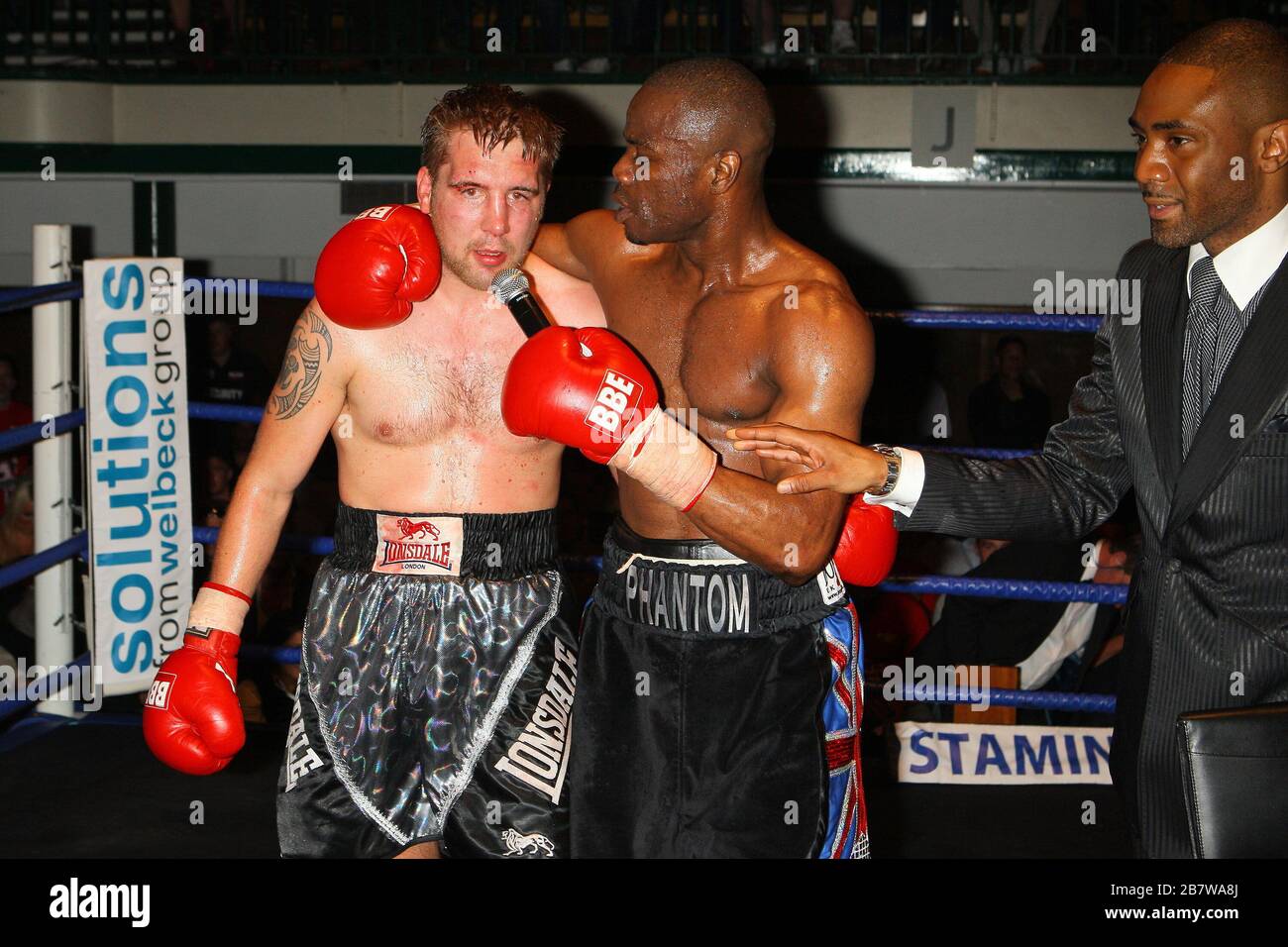 Tony Salam (black shorts) defeats Shon Davies in a Super-Middleweight ...