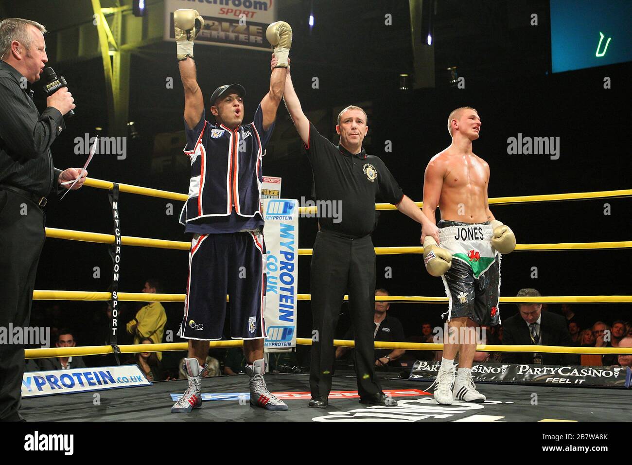 Young Mutley (dark blue shorts) defeats Barrie Jones in the Quarter ...