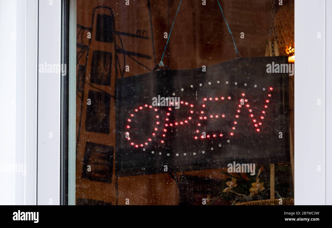 Sign Open in a store Stock Photo - Alamy