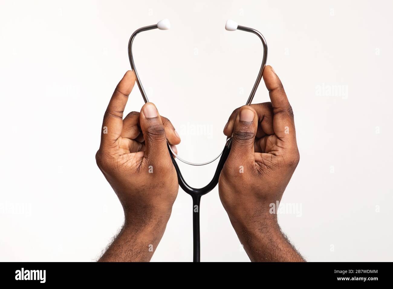 Hands of doctor wearing stethoscope before check up Stock Photo - Alamy