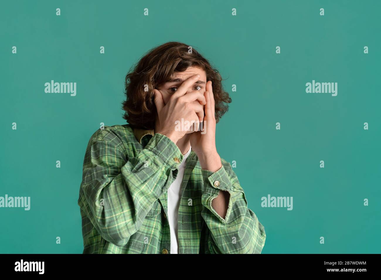 Curly boy afraid hi-res stock photography and images - Alamy