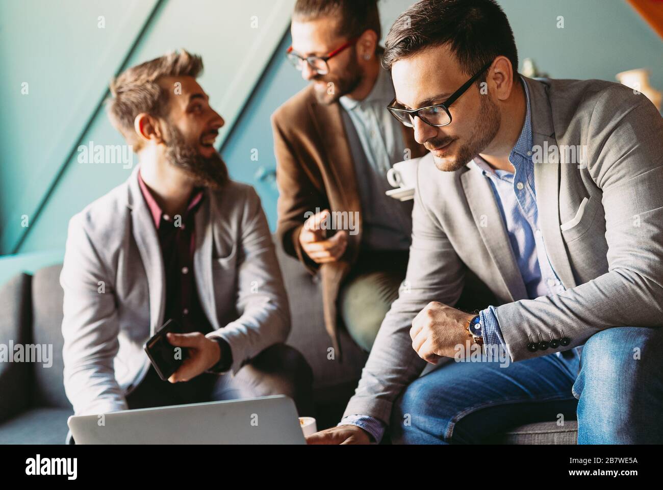 Happy laughing business man talking hi-res stock photography and images ...
