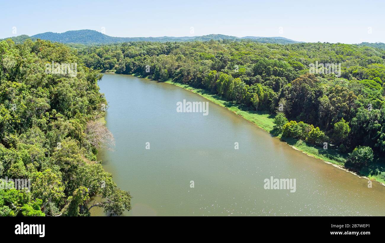 Tropical jungle green trees river hills thick density vegetation rural ...