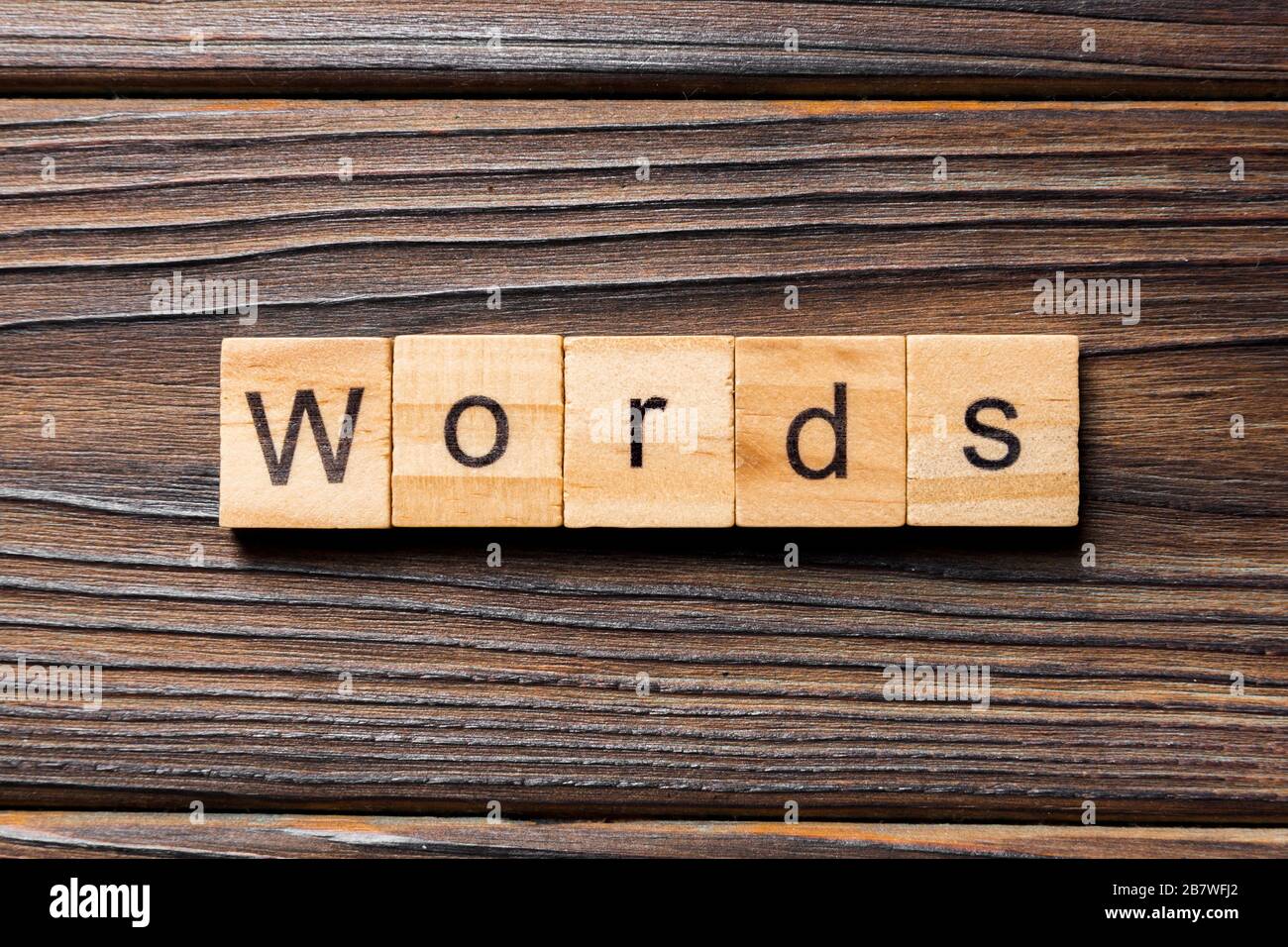 word written on wood block. WORD text on wooden table for your desing ...