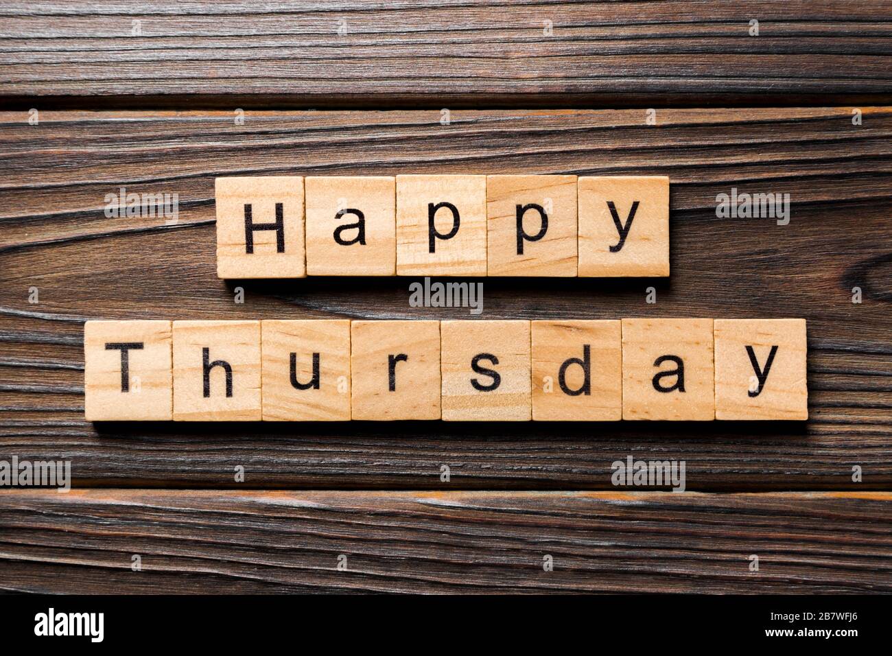 Happy thursday word written on wood block. Happy thursday text on ...