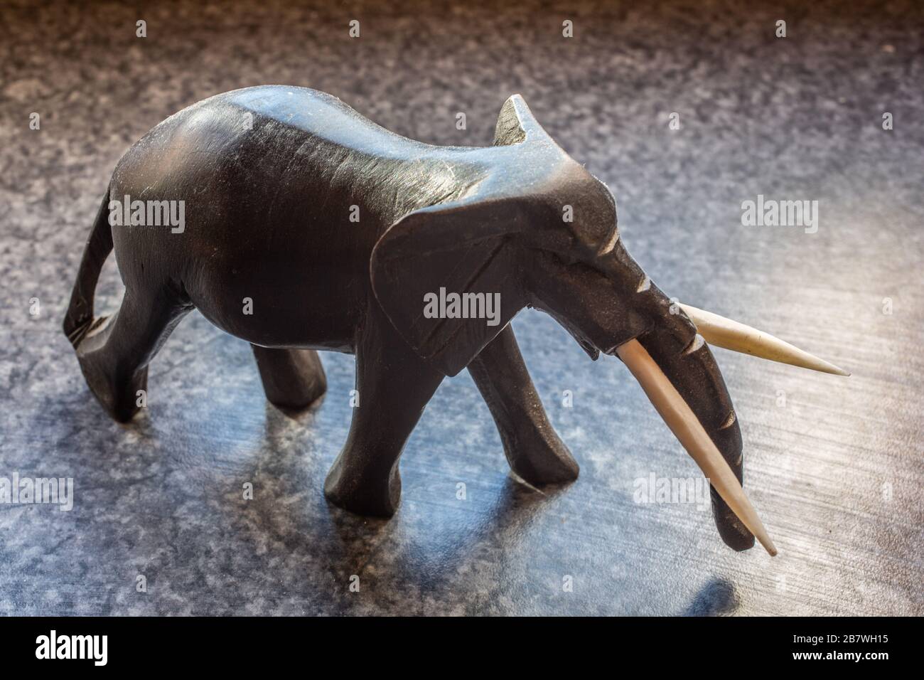 carved pachyderm with tusks Stock Photo - Alamy