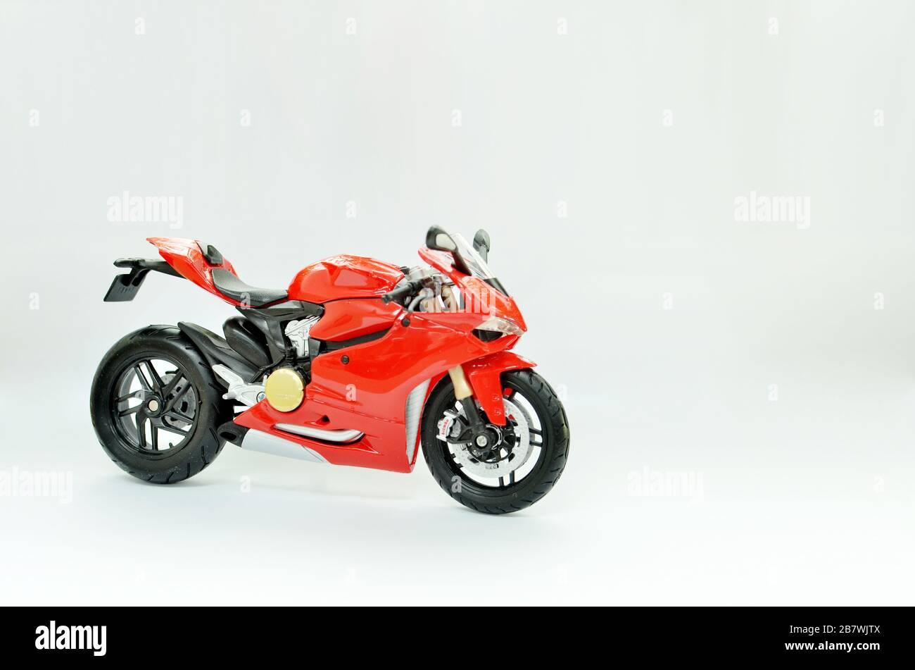 Red motor bike toy Stock Photo - Alamy