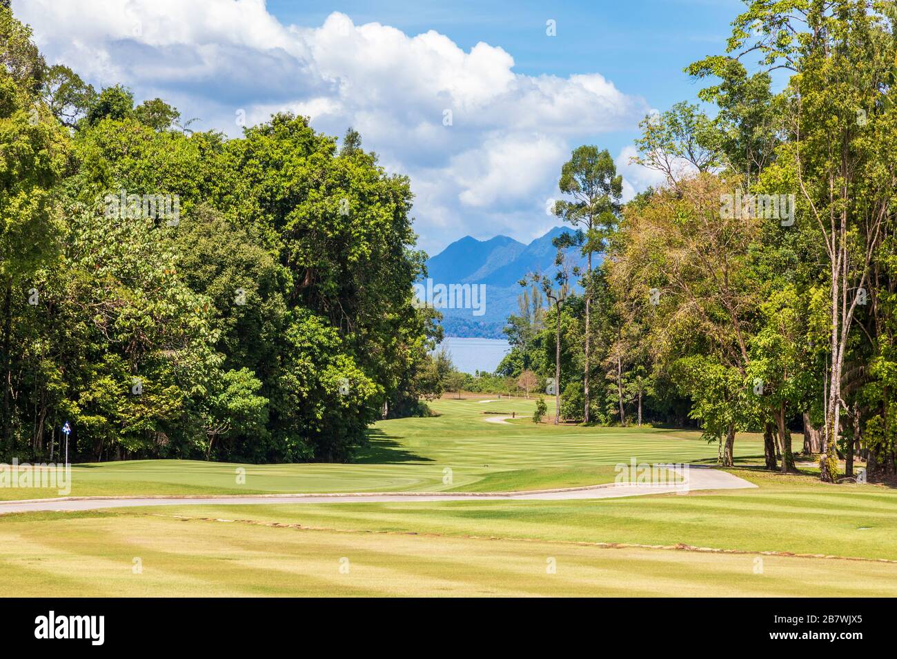 Eighteenth putting green and view along the fairway towards the Strait ...