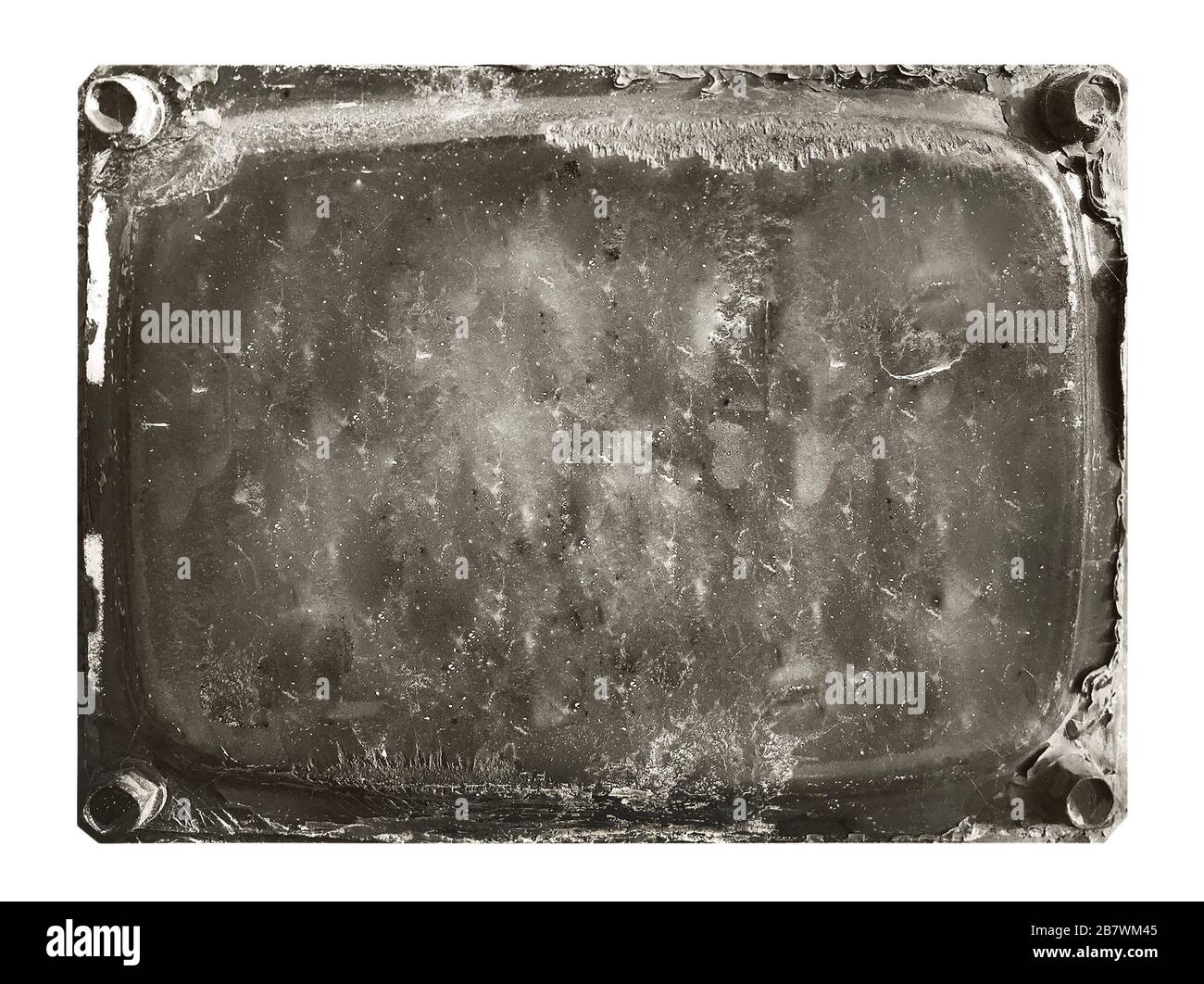 vintage screwed metal plaque, isolated Stock Photo - Alamy