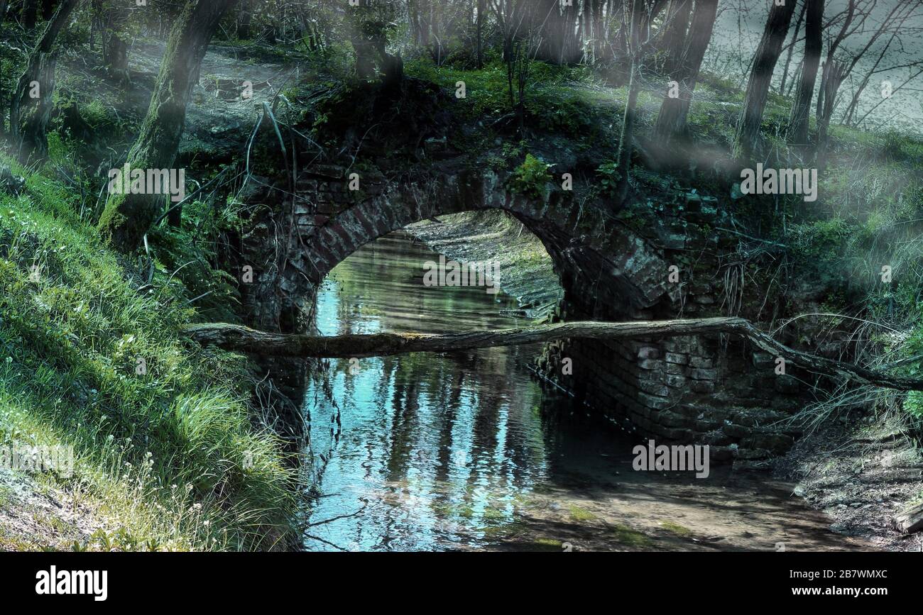old abandoned bridge on a small river Stock Photo - Alamy