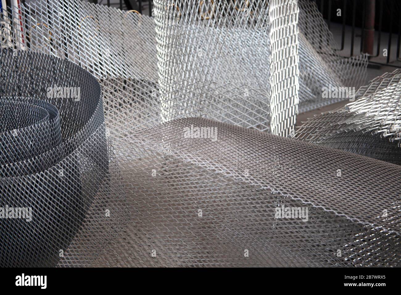 Rolls of steel wire mesh. Background Stock Photo - Alamy