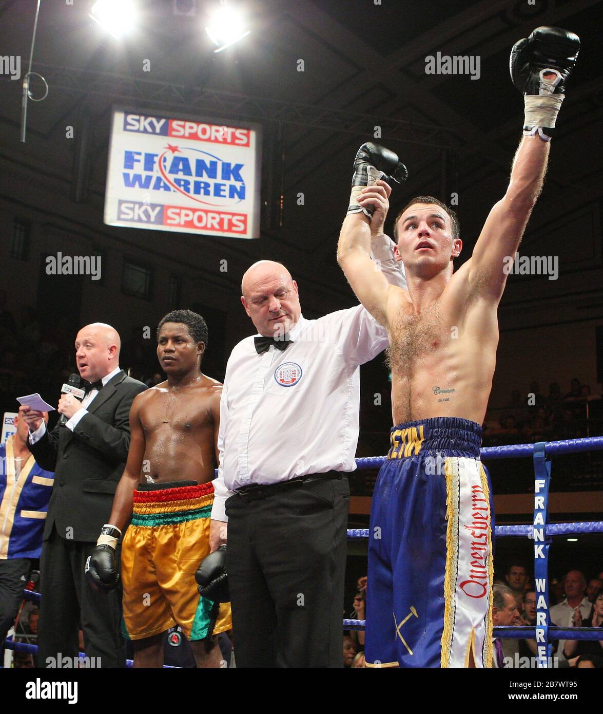Kevin Mitchell (Dagenham, blue shorts) defeats Lanquaye Wilson (gold ...