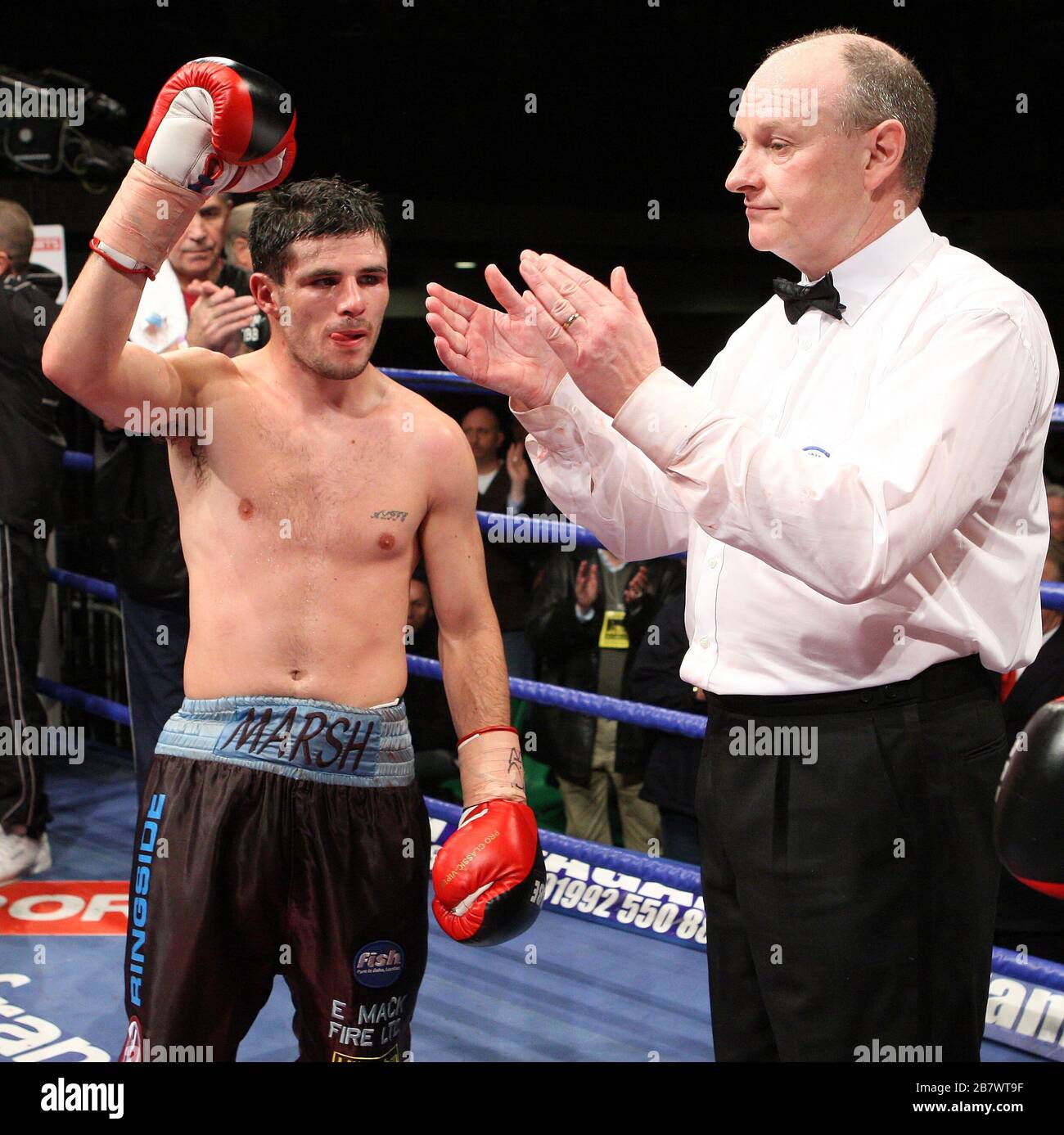 Matthew Marsh (claret/blue shorts) defeats Rocky Dean (Thetford, black ...