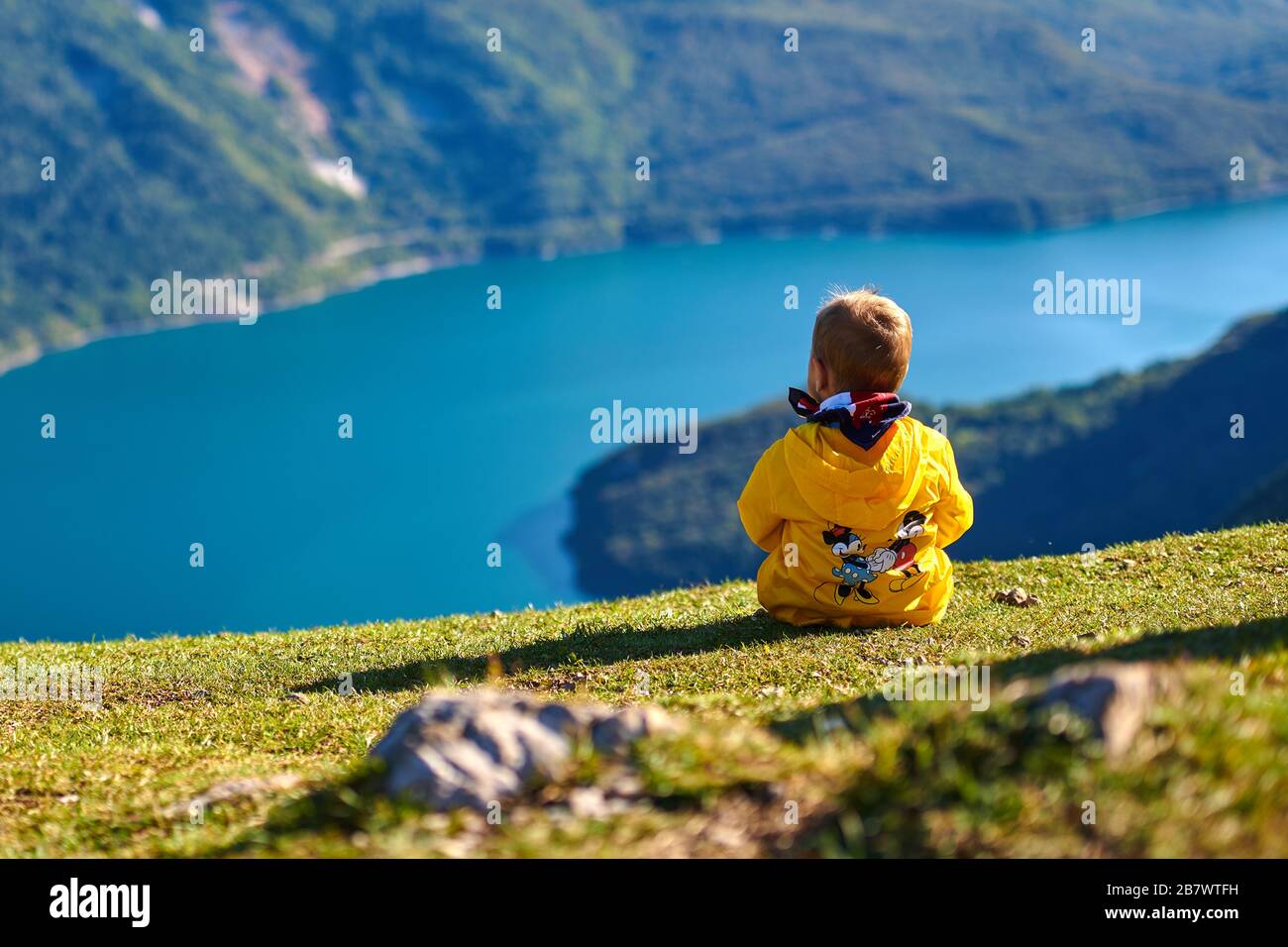 Aerial view over the beautiful Molveno town and Molveno lake, an alpine ...