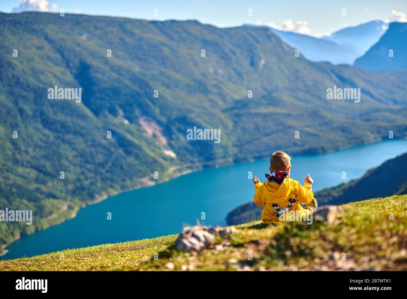 Aerial view over the beautiful Molveno town and Molveno lake, an alpine ...
