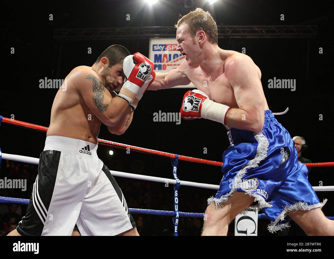 George Groves (blue shorts) defeats Grigor Sarohanian in a Super ...