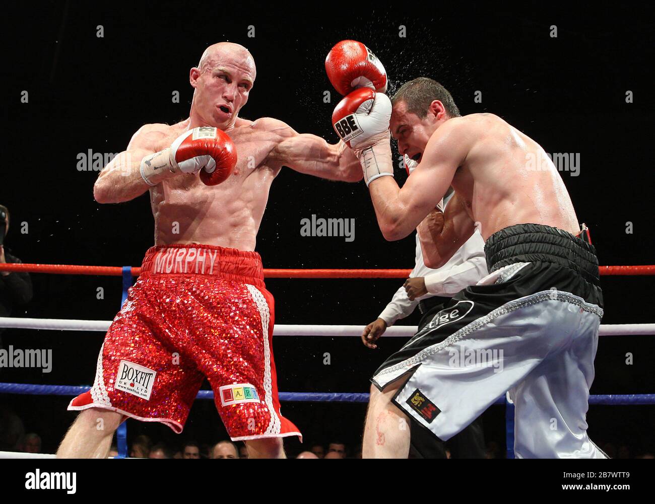 Ben Murphy (red shorts) defeats Lee Cook in a Lightweight boxing ...