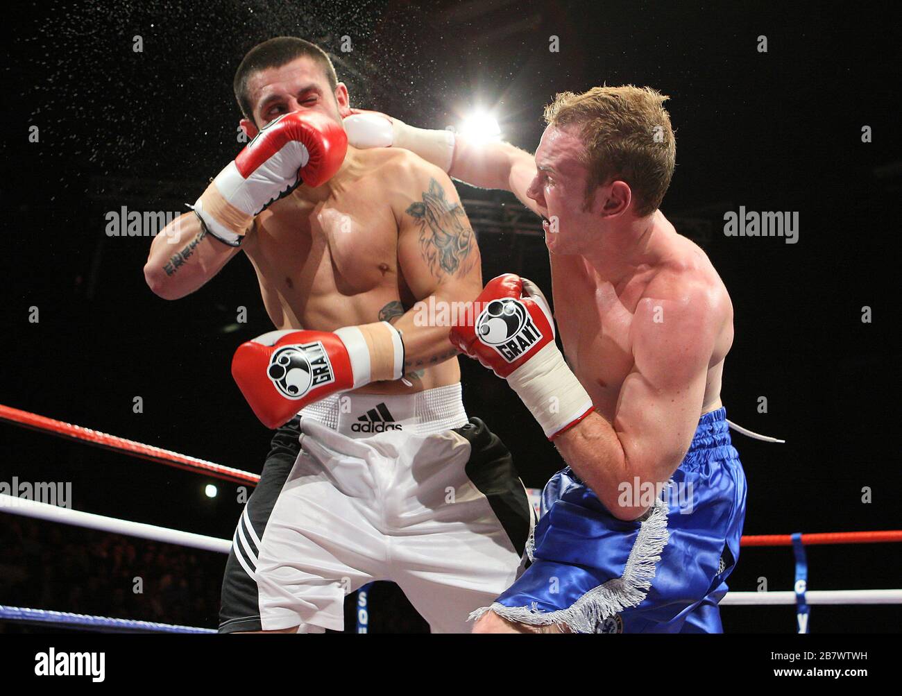 George Groves (blue shorts) defeats Grigor Sarohanian in a Super ...