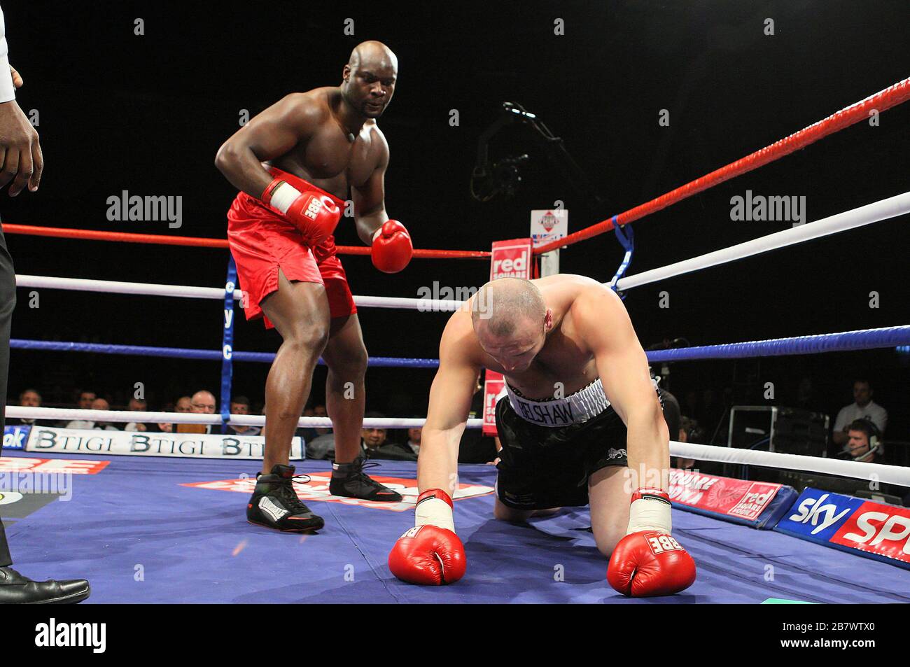 Larry Olubamiwo (red shorts) defeats Scott Belshaw in a Heavyweight ...