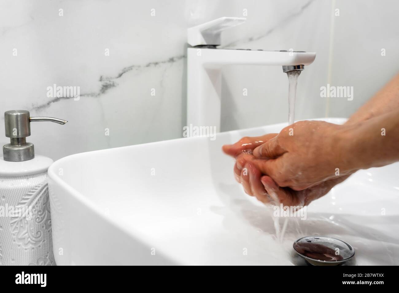 Washing hands wash basin hi-res stock photography and images - Alamy