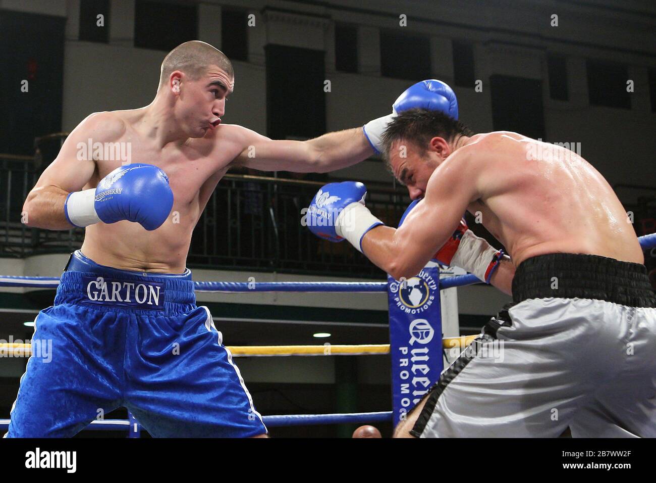 Johnny Garton (blue) shorts defeats Danny Dontchev in a Welterweight ...