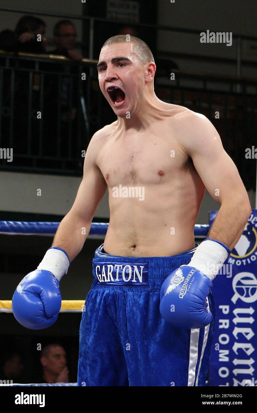 Johnny Garton (blue) shorts defeats Danny Dontchev in a Welterweight ...