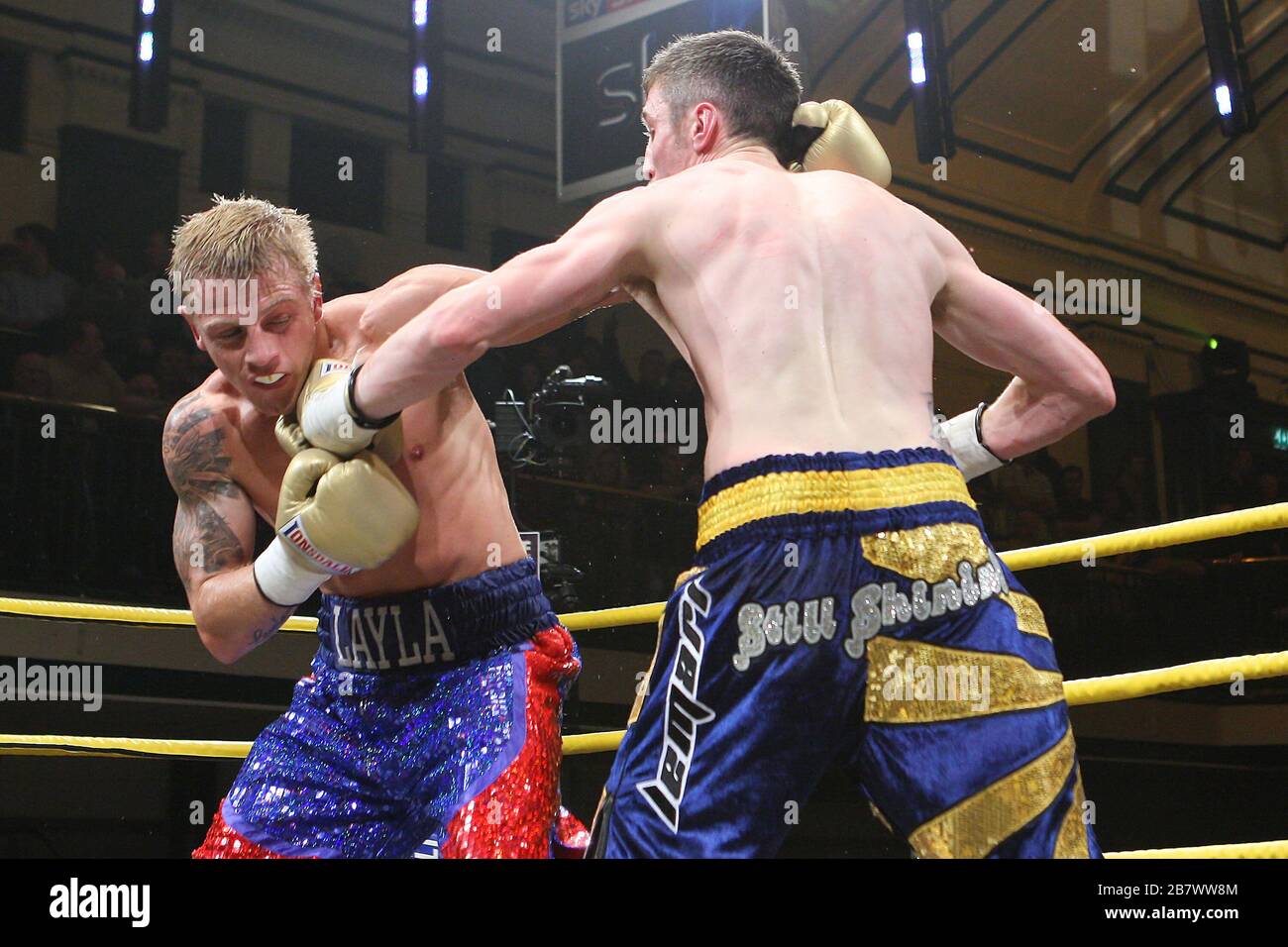 Gary Sykes (blue/red shorts) defeats Scott Lawton (gold/blue shorts) in ...