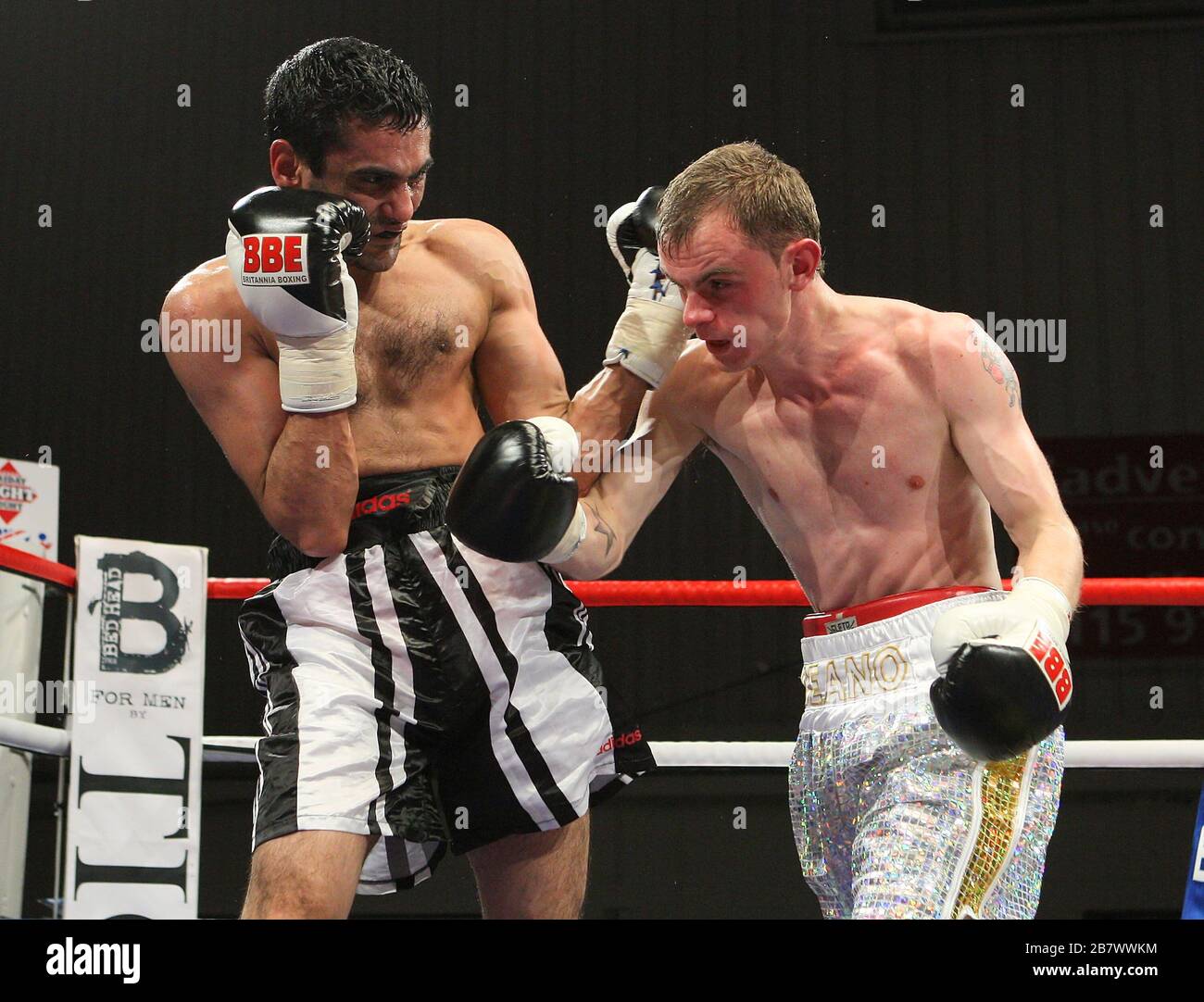 Leon Deans (white/gold shorts) defeats Sid Razak in a Lightweight ...