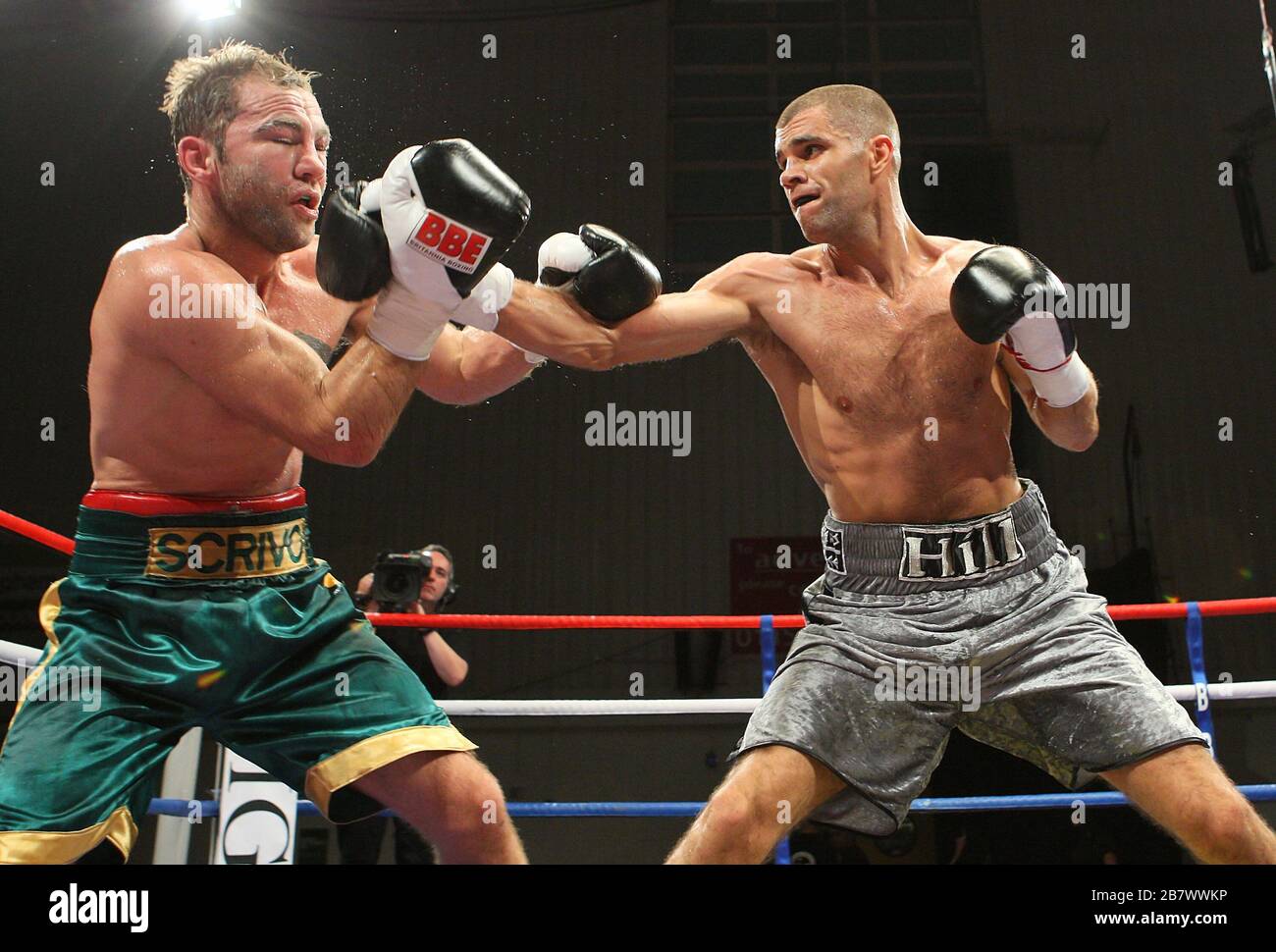 Tony Hill (silver shorts) defeats Matt Scriven in a Middleweight boxing ...