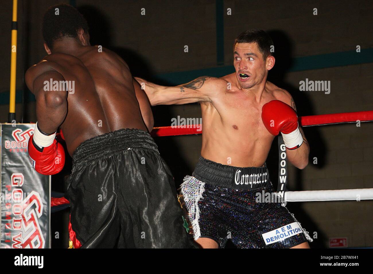 Tony Conquest (dark blue/silver shorts) defeats Prnce George Akrong in ...