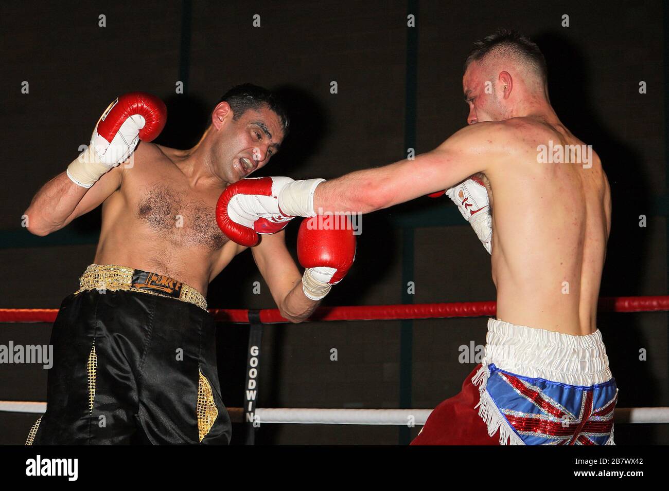 Michael Devine (claret shorts) defeats Sid Razak in a Lightweight ...