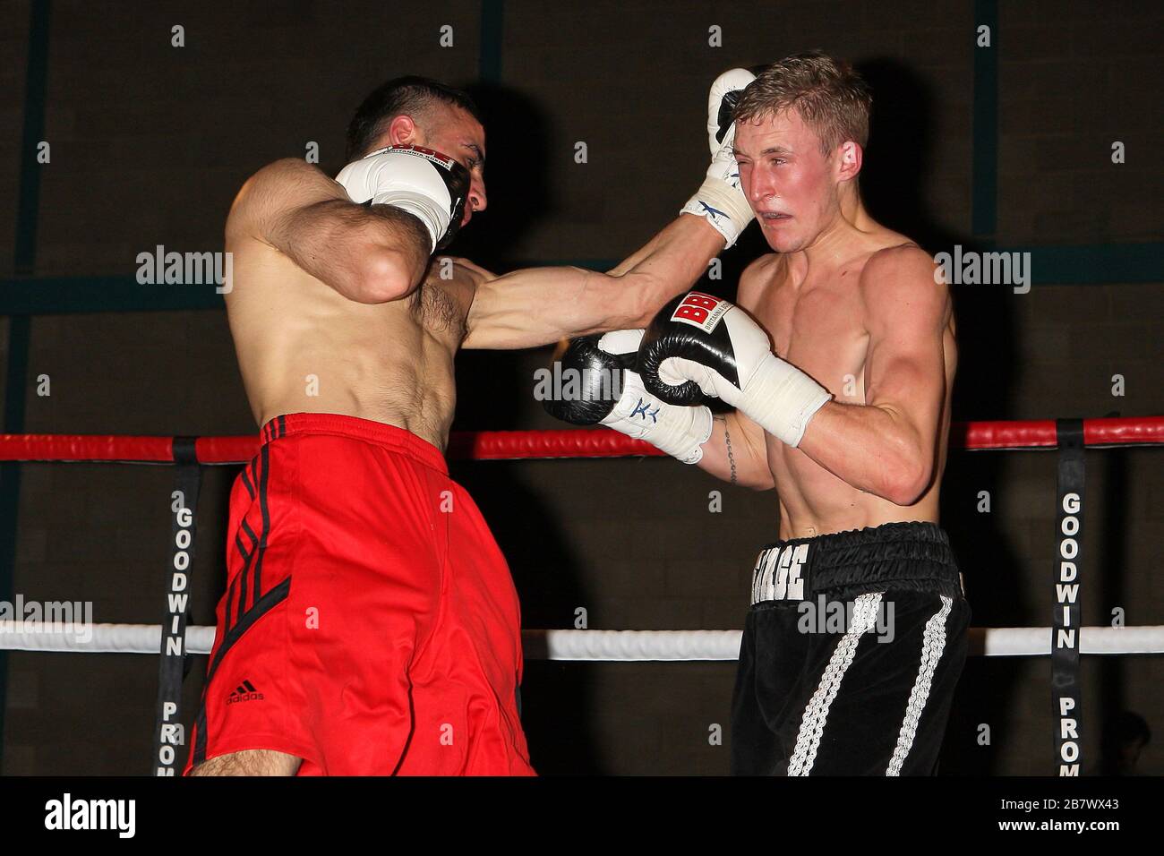Raffi Khan (red shorts) defeats Goerge Jupp in a SuperFeatherweight ...