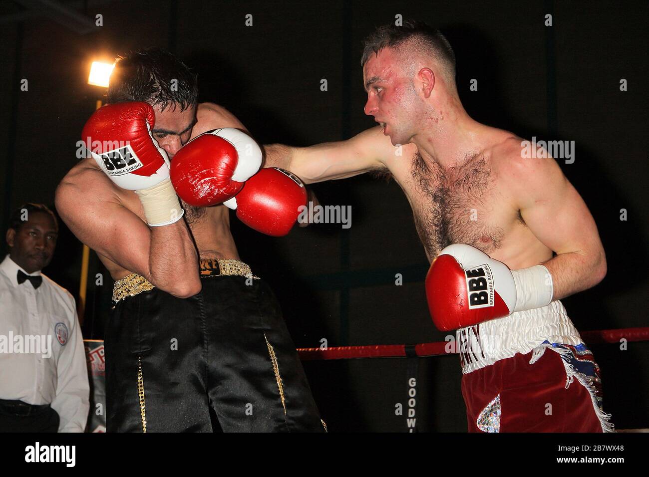 Michael Devine (claret shorts) defeats Sid Razak in a Lightweight ...