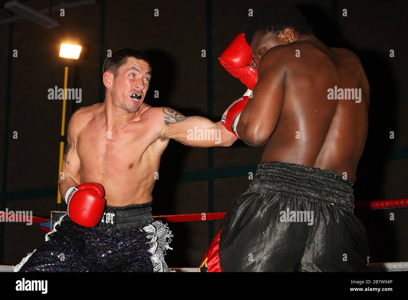 Tony Conquest (dark blue/silver shorts) defeats Prnce George Akrong in ...