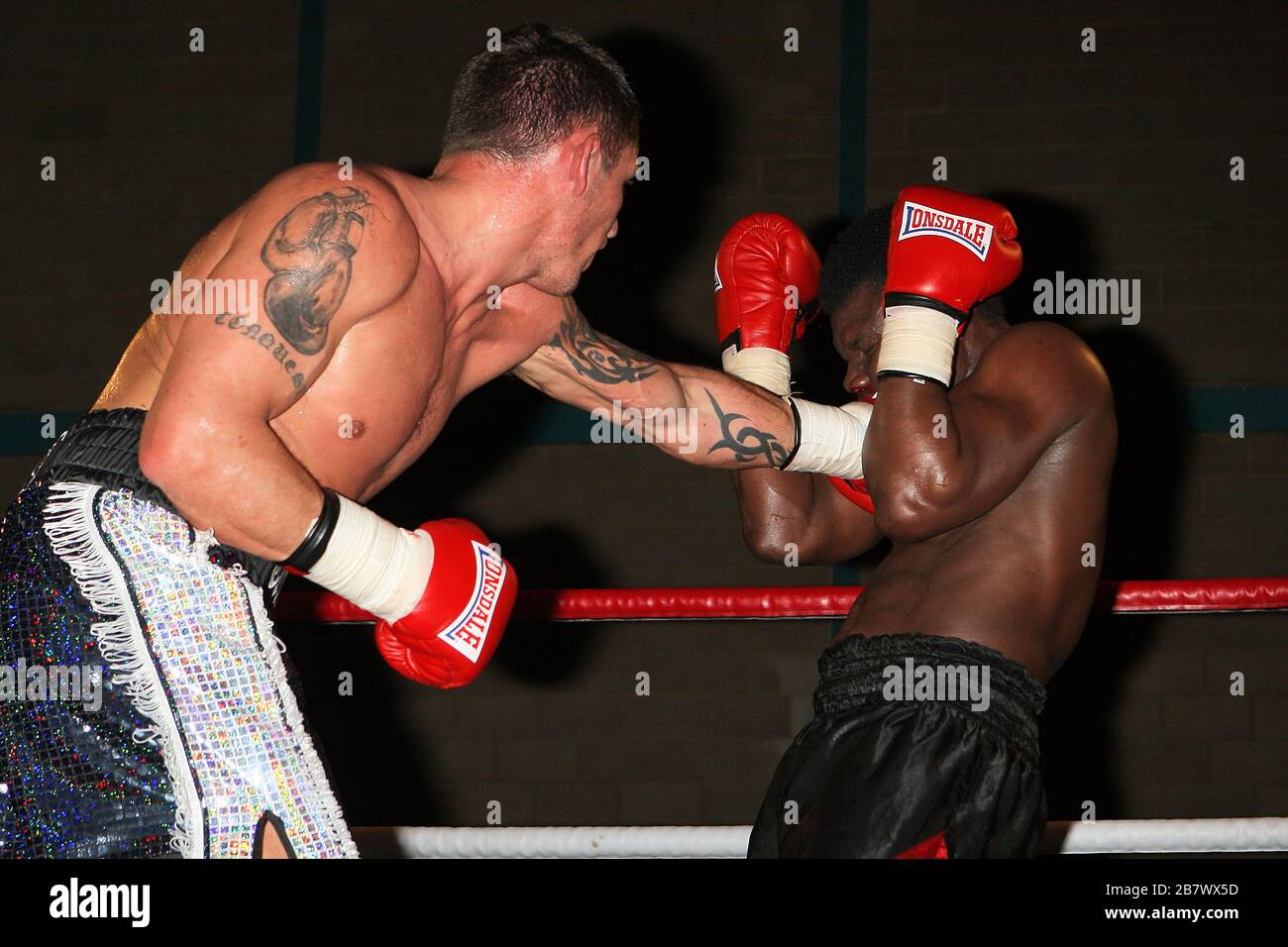Tony Conquest (dark blue/silver shorts) defeats Prnce George Akrong in ...