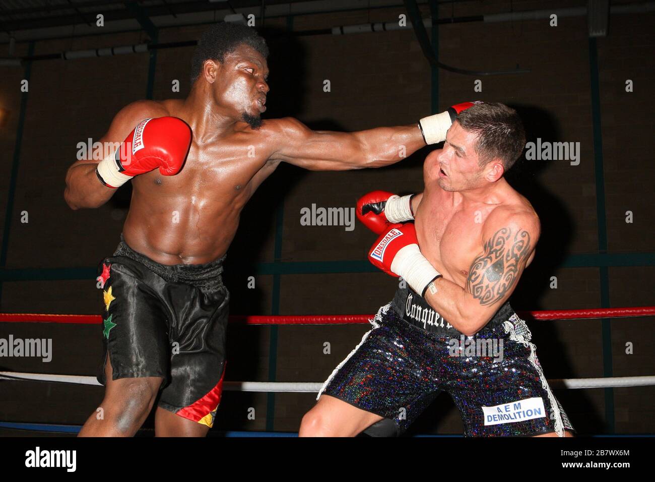 Tony Conquest (dark blue/silver shorts) defeats Prnce George Akrong in ...