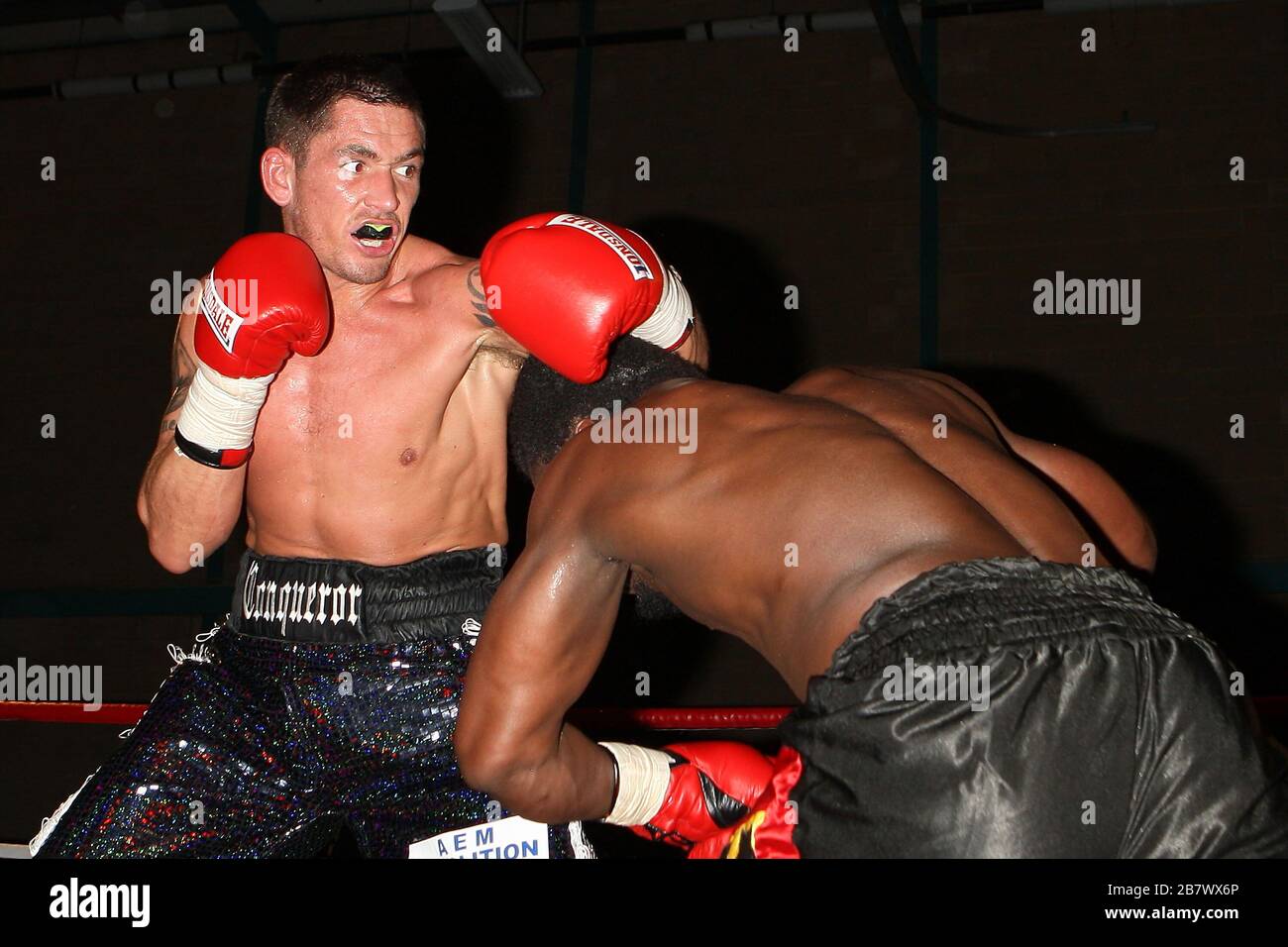 Tony Conquest (dark blue/silver shorts) defeats Prnce George Akrong in ...