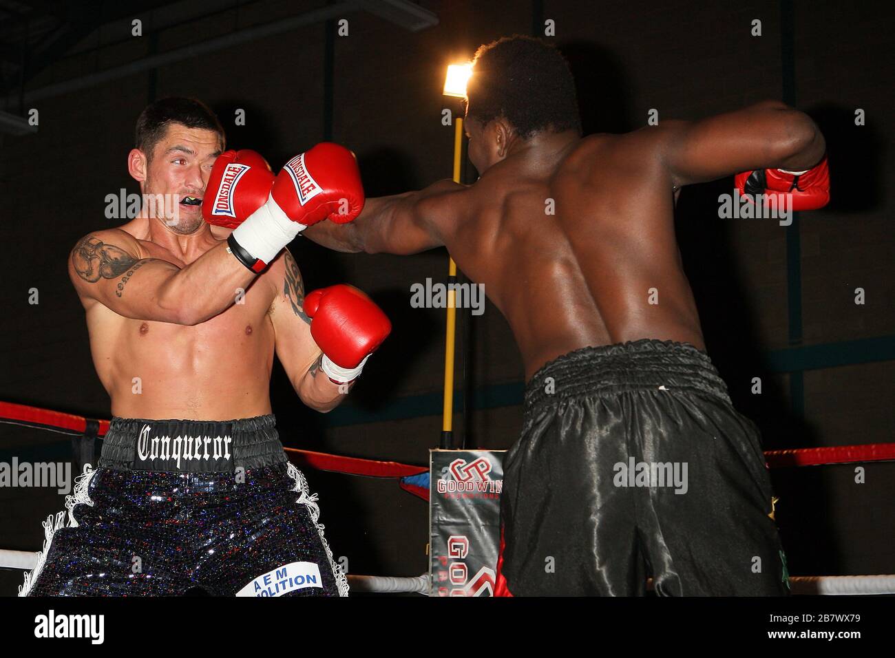 Tony Conquest (dark blue/silver shorts) defeats Prnce George Akrong in ...