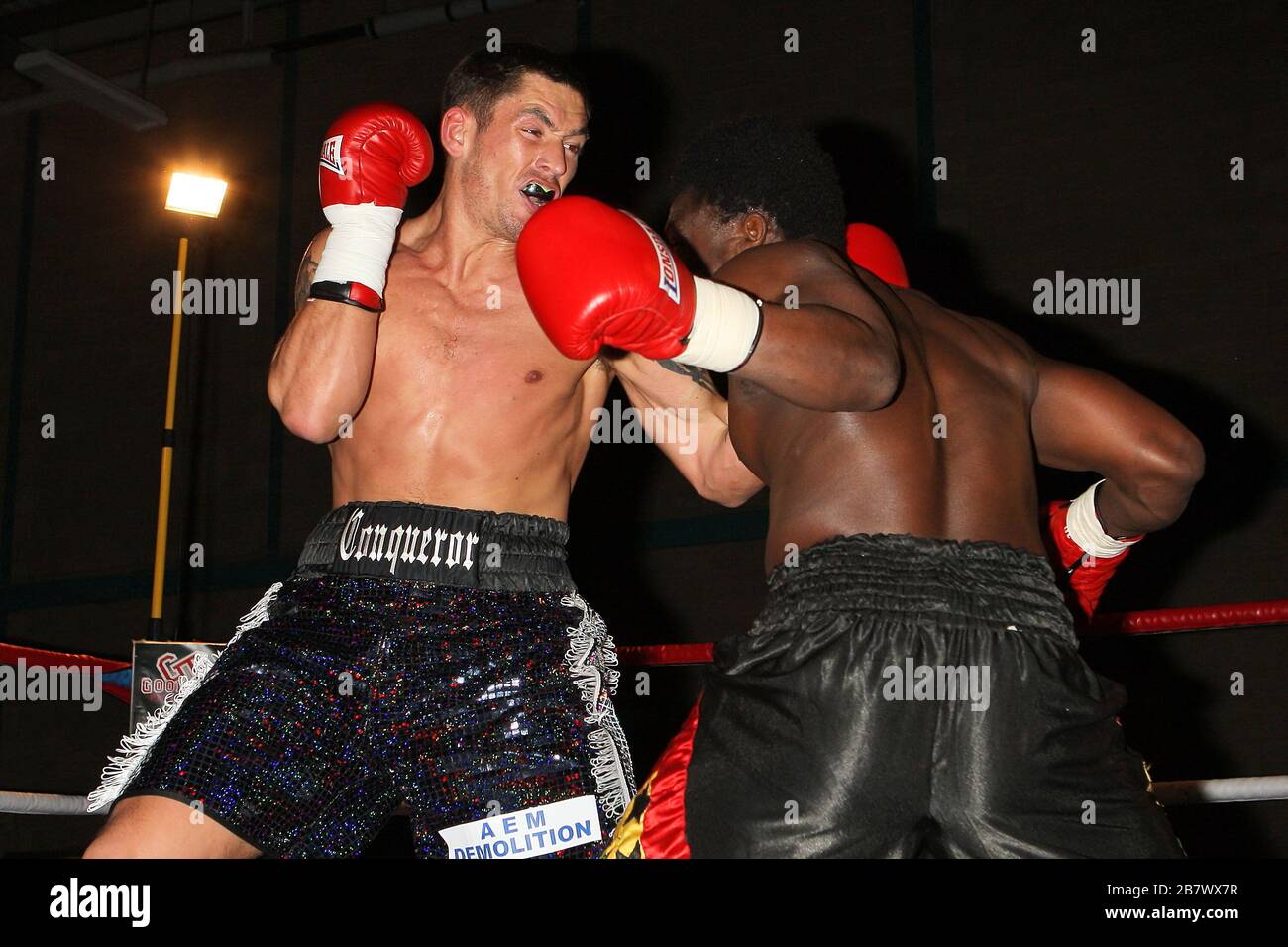 Tony Conquest (dark blue/silver shorts) defeats Prnce George Akrong in ...