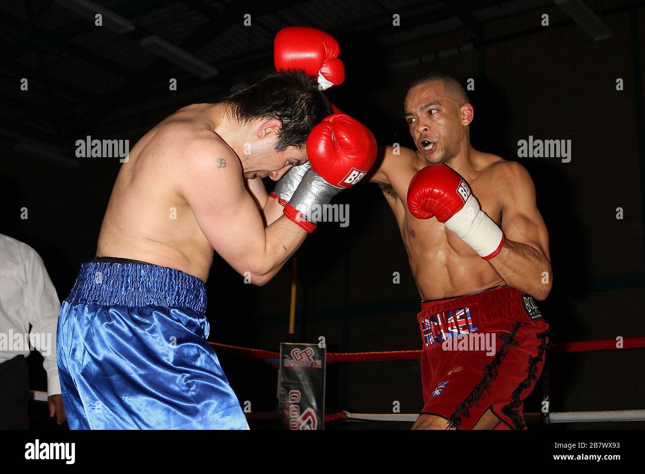 Michael Norgrove (red shorts) defeats Jan Balog in a LightMiddleweight ...