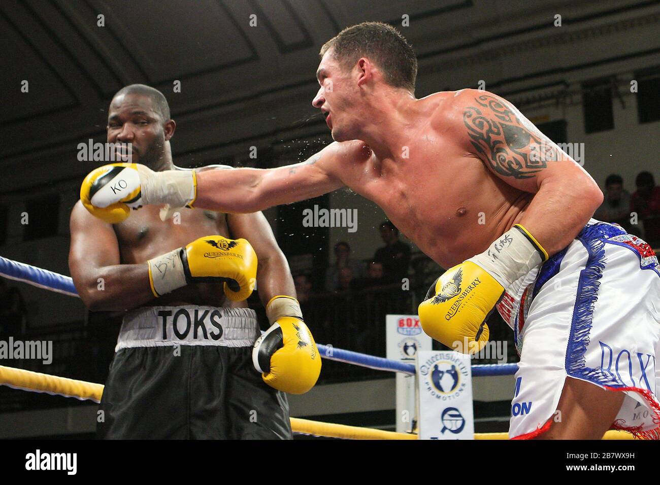 Tony Conquest (white shorts) defeats Toks Owoh in a Cruiserweight ...
