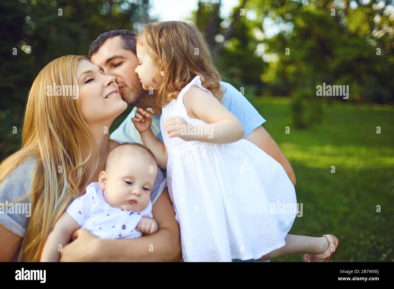 Father daughter mother sit hi-res stock photography and images - Alamy