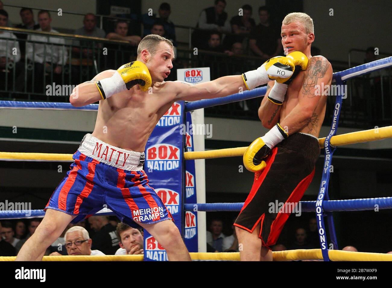Matty Tew (red/blue shorts) defeats Robin Deakin in a Light ...