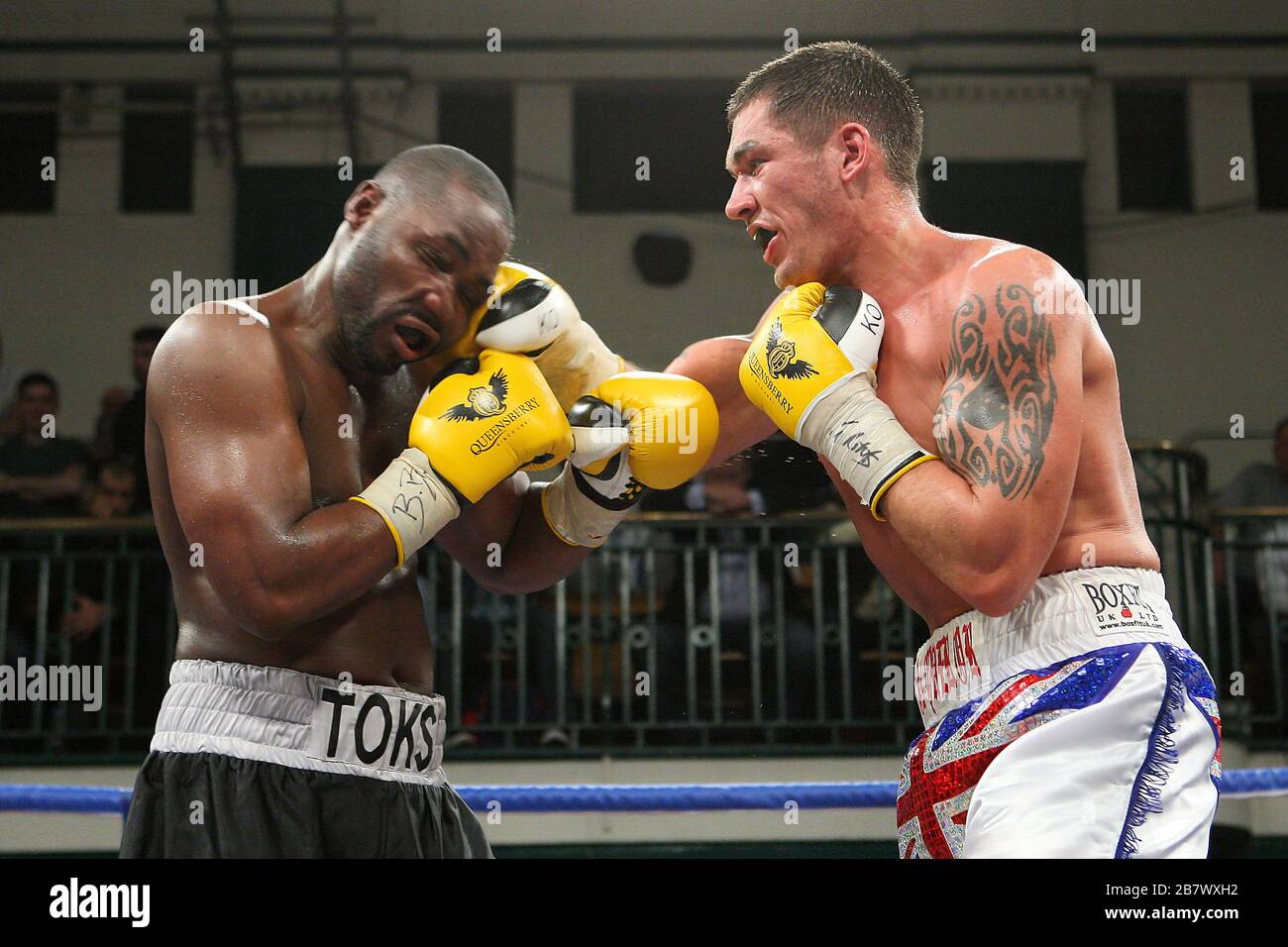 Tony Conquest (white shorts) defeats Toks Owoh in a Cruiserweight ...