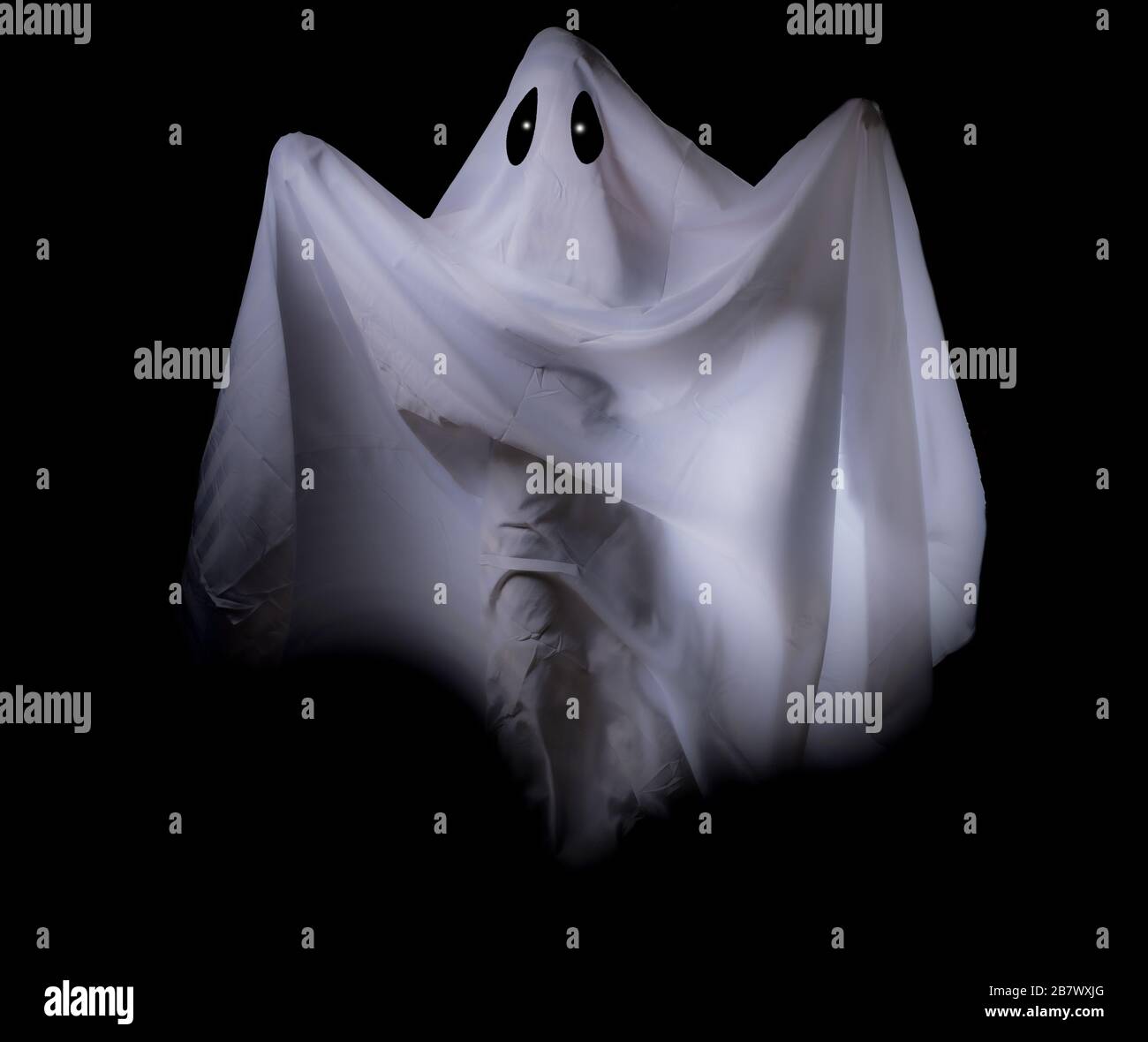Scary white ghost at big eye on a black background for Halloween ...